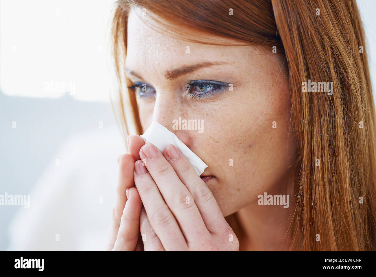 WOMAN WITH RHINITIS Stock Photo - Alamy
