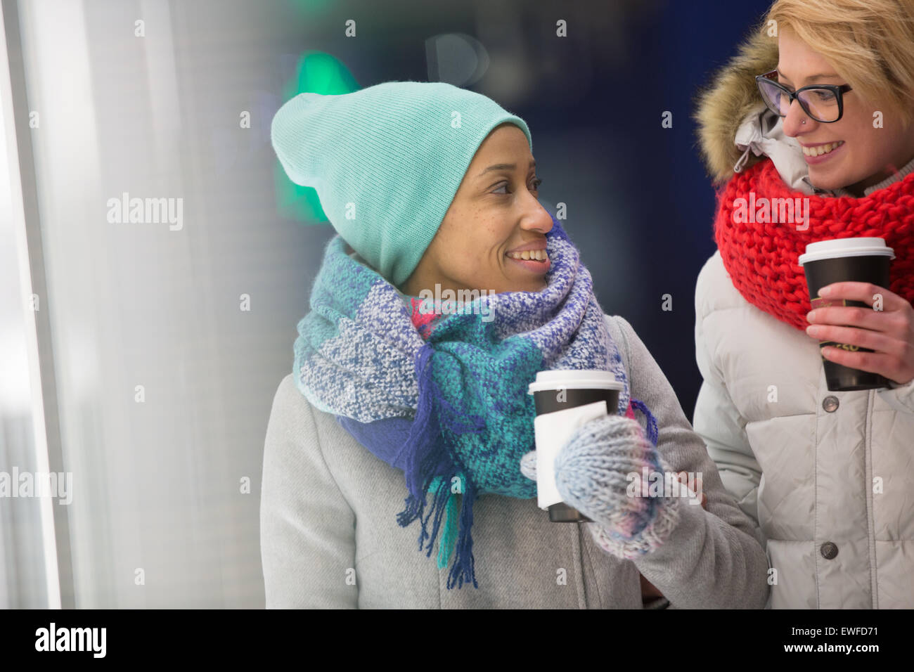 Two young women with cups hi-res stock photography and images - Alamy