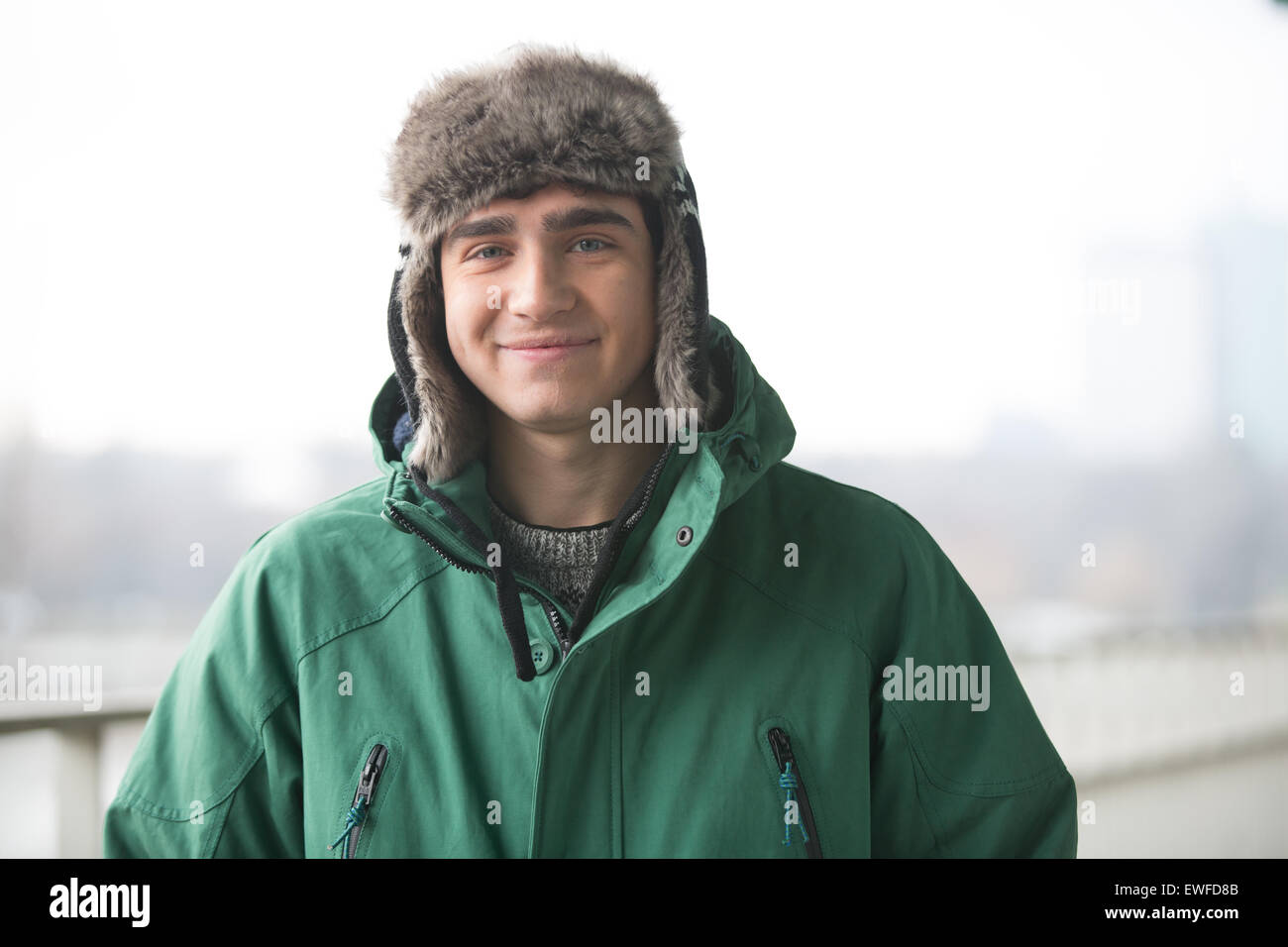 Portrait of man in winter wear smiling outdoors Stock Photo - Alamy