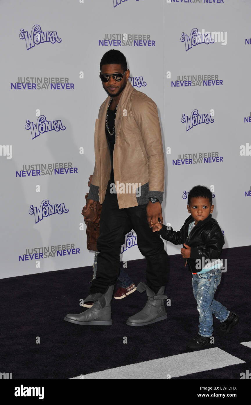 LOS ANGELES, CA - FEBRUARY 8, 2011: Usher & children at the Los Angeles ...