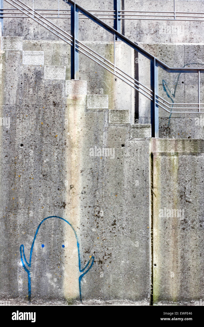 a graffiti of a ghost in a wall of a ladder Stock Photo - Alamy