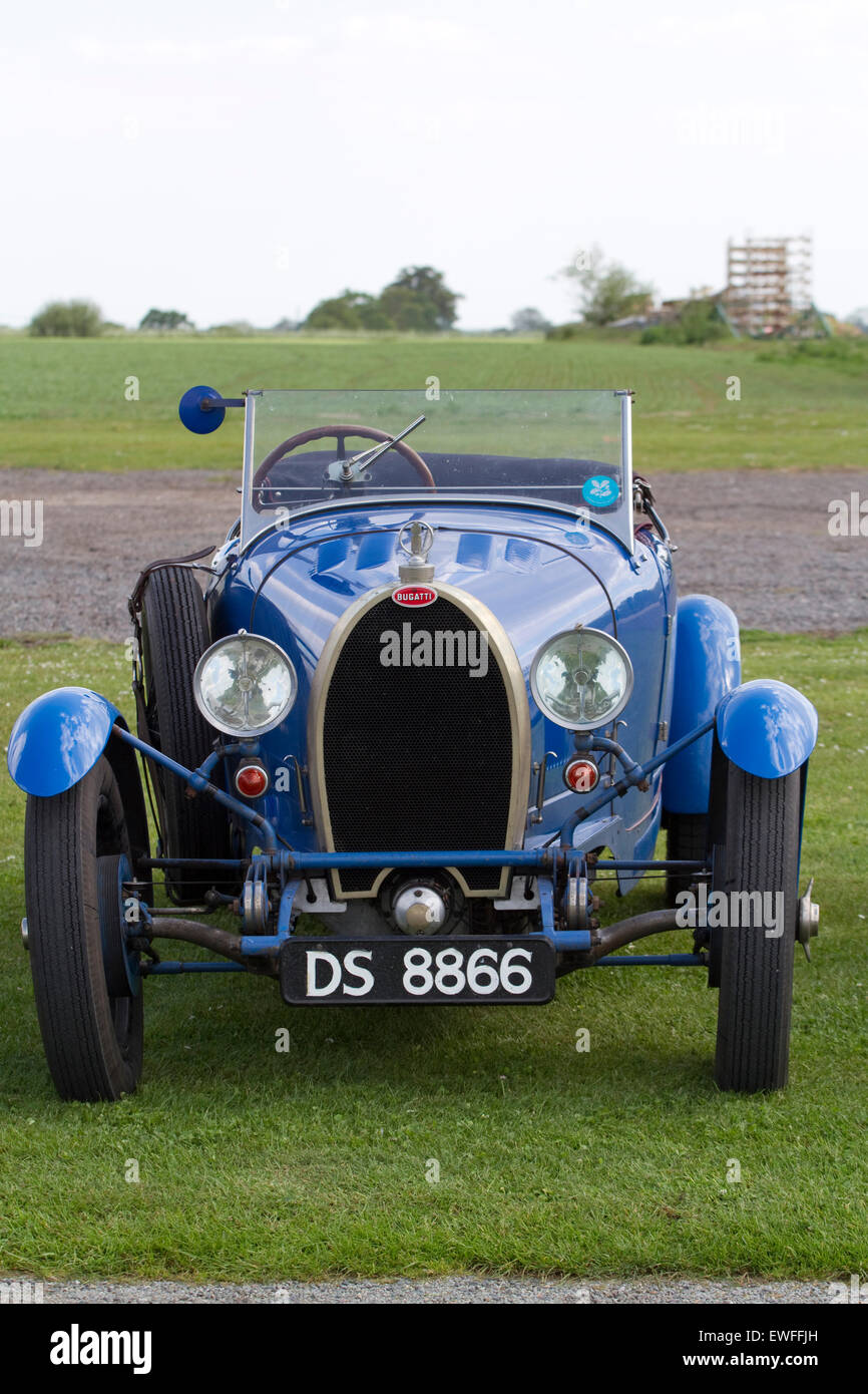 Blue vintage open top Bugatti car in a field Stock Photo - Alamy