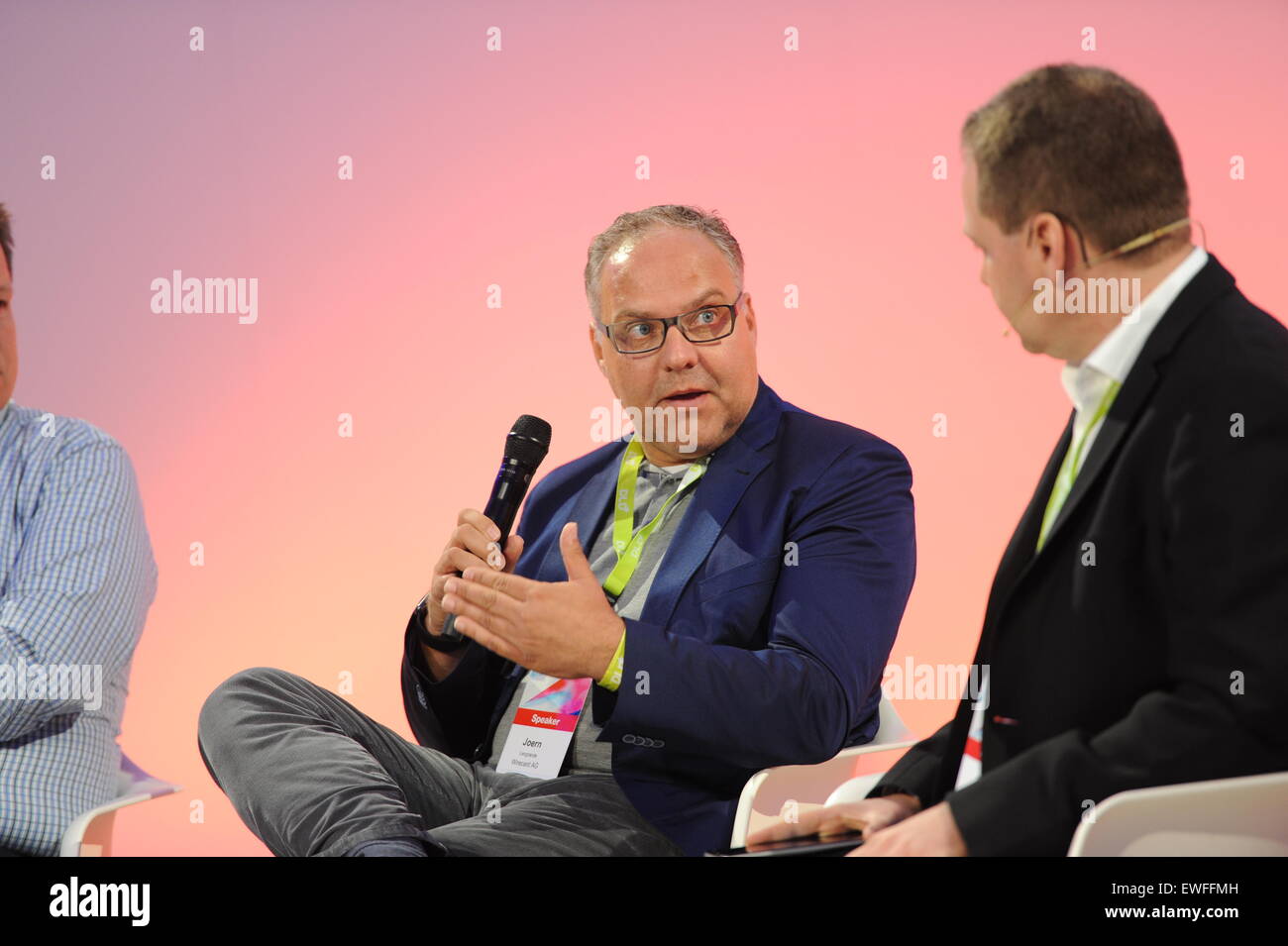 MUNICH/GERMANY - JUNE 23: Joern Leogrande (Wirecard, l.) speaks with ...