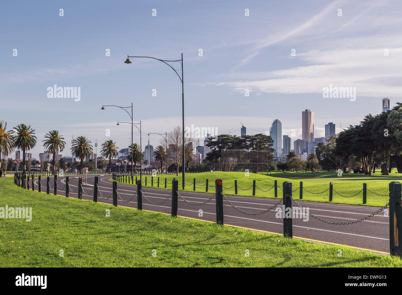 Melbourne City skyline seen from Albert Park Lake and Lakeside Drive ...