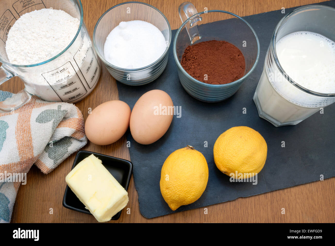 some ingredients used in order to to a cake Stock Photo - Alamy