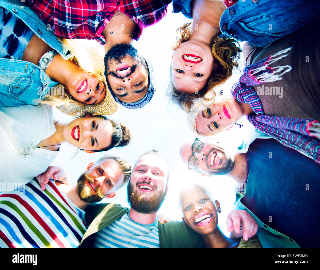 Friendship huddle happiness beach hi-res stock photography and images ...