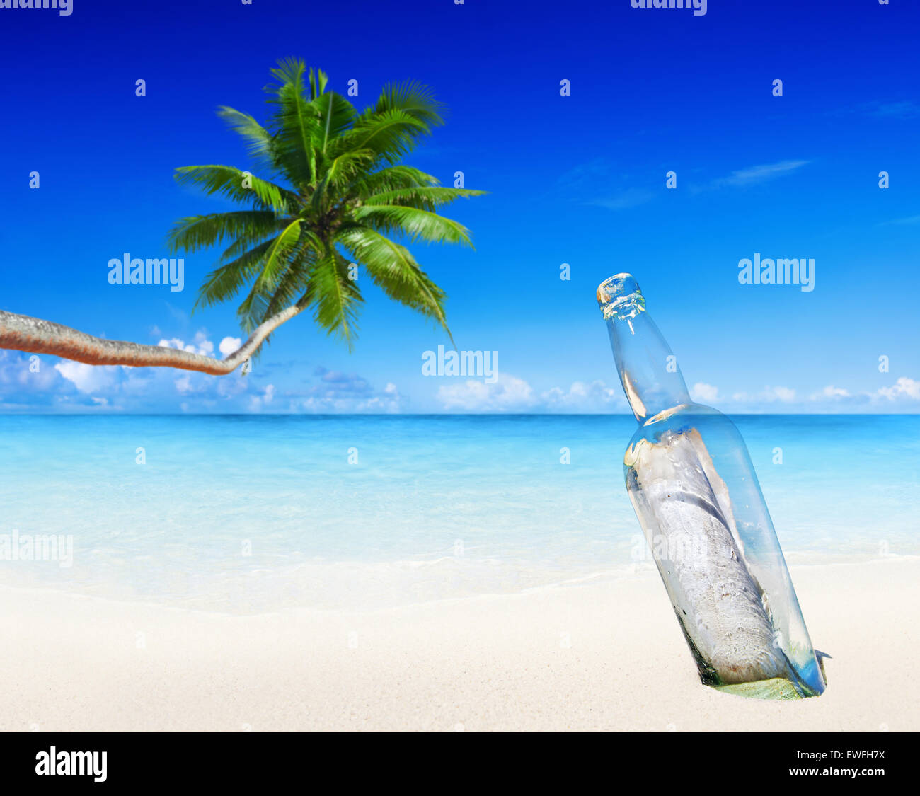 Message in a bottle on beach Stock Photo - Alamy
