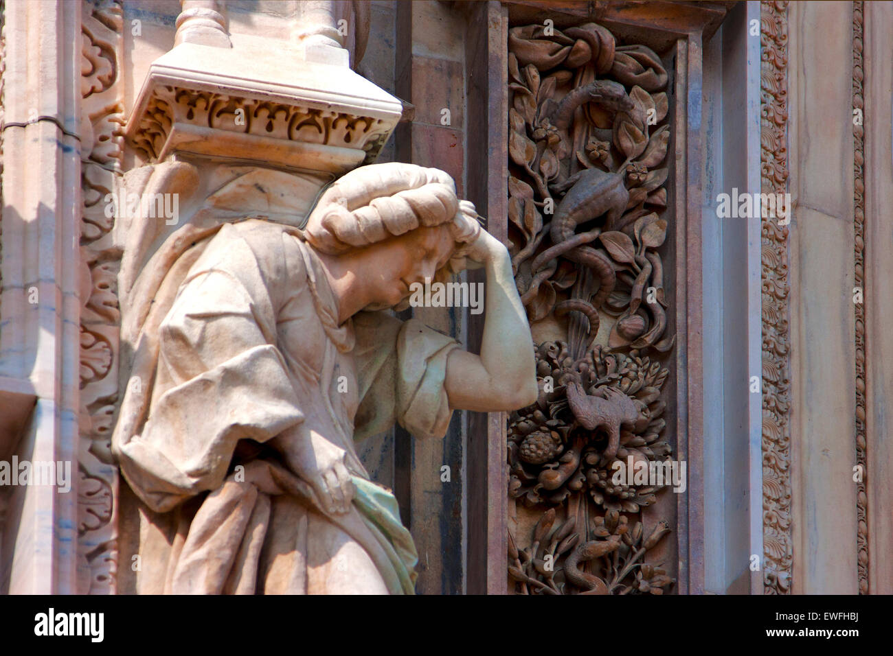 italy church statue the front of the duomo in milan and column Stock ...