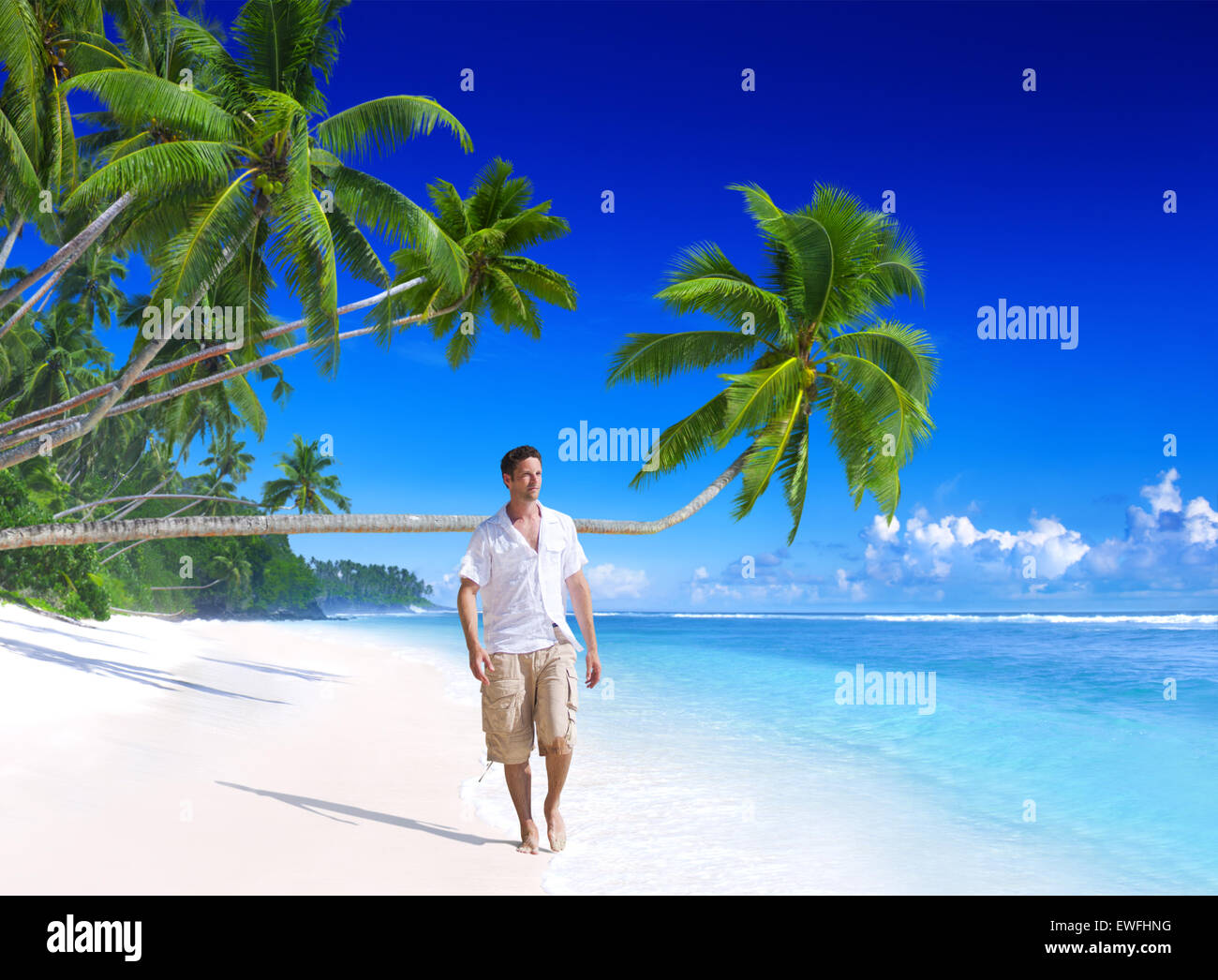 Man relaxing on the beach Stock Photo - Alamy
