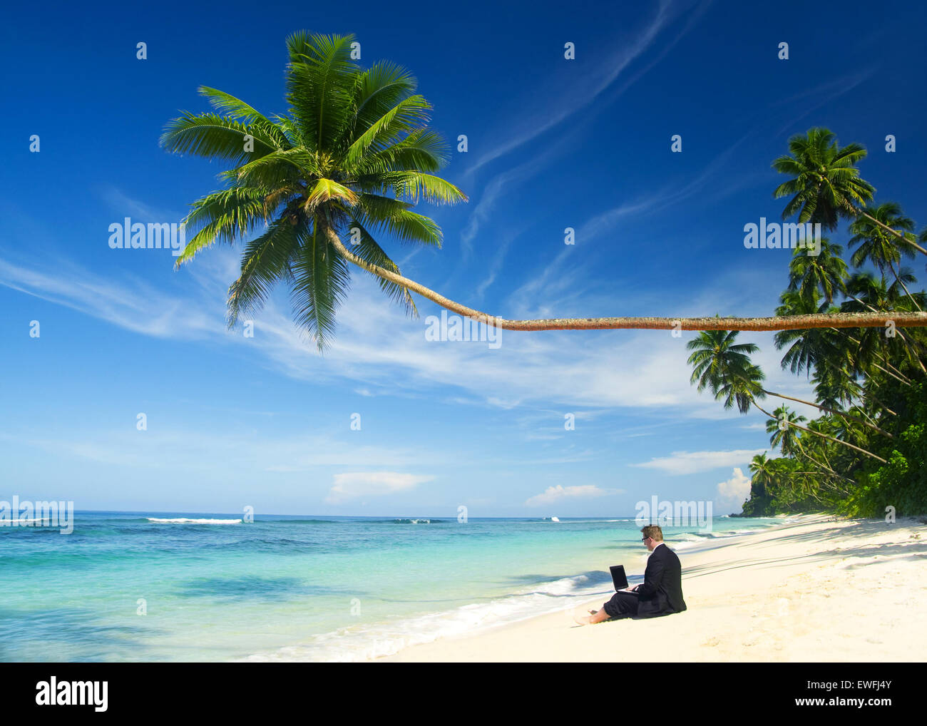 Businessman working at the beach Stock Photo - Alamy