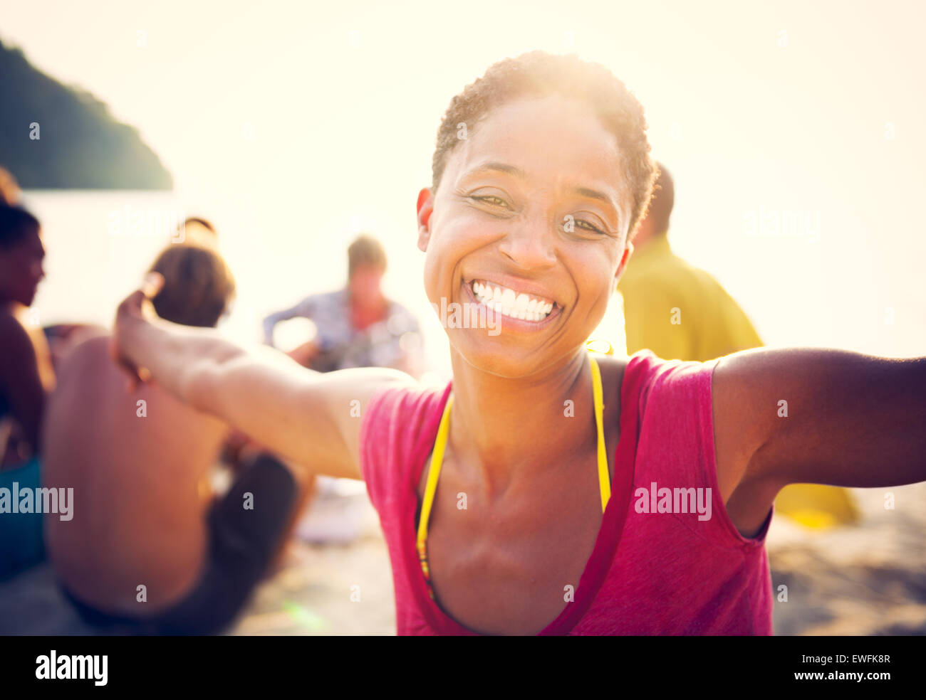 Group of people party on the beach Stock Photo - Alamy