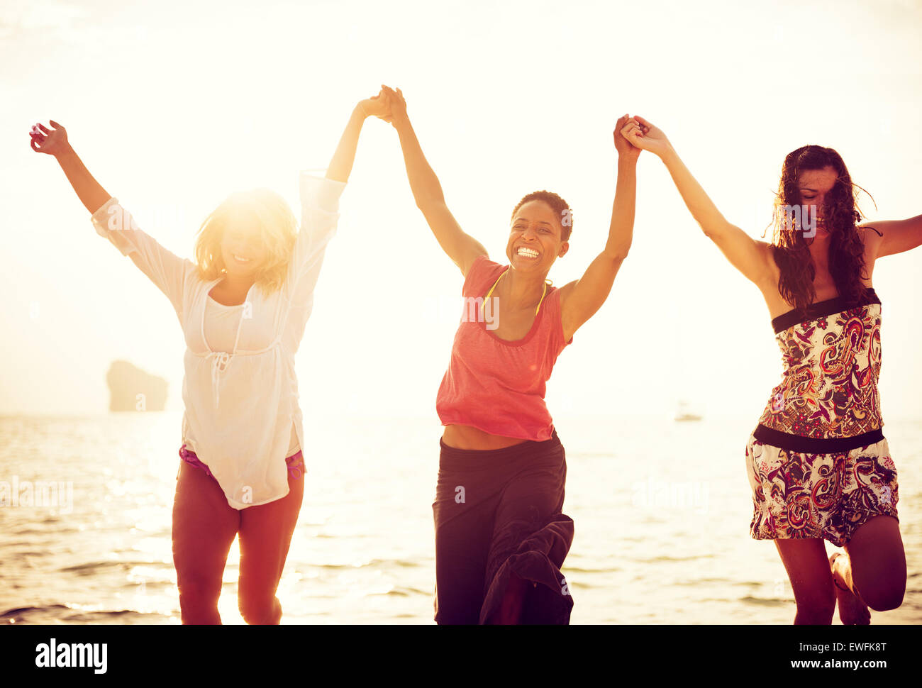 Group of people party on the beach Stock Photo - Alamy