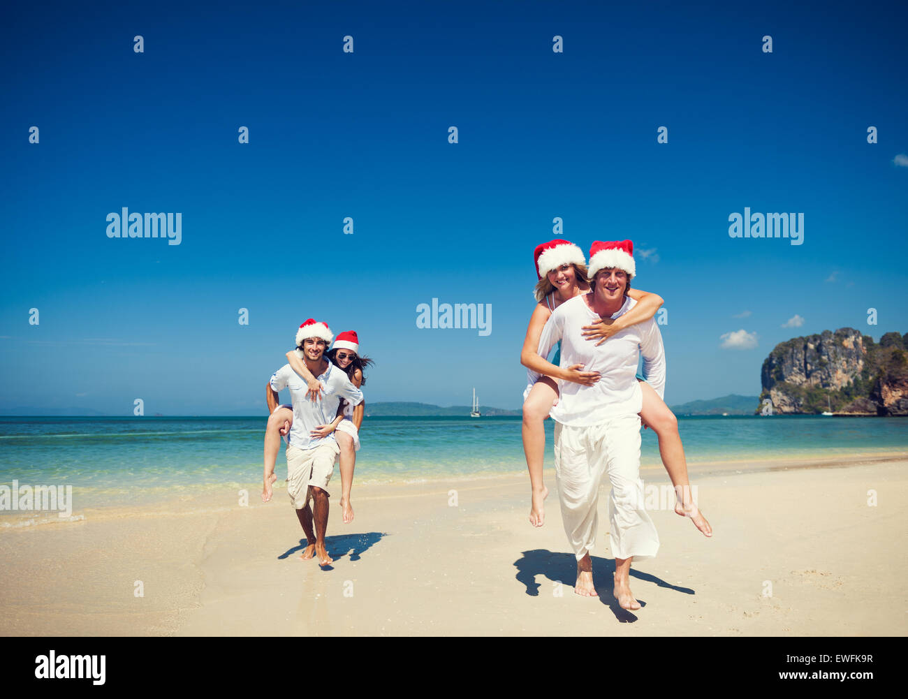 Sweet couples having fun on the beach Stock Photo - Alamy