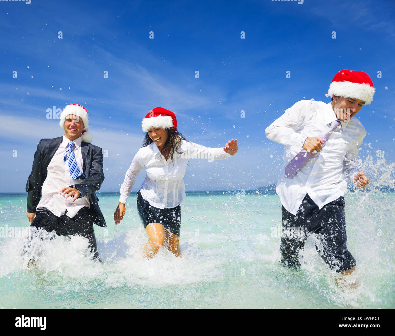 Office worker having Fun on the beach on Christmas Stock Photo - Alamy