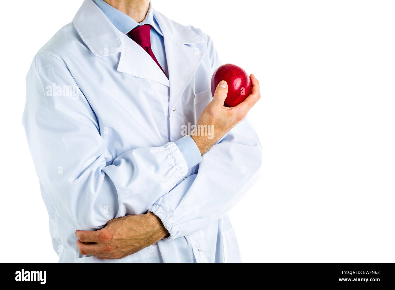 Caucasian male doctor dressed in white coat, blue shirt and red tie is ...