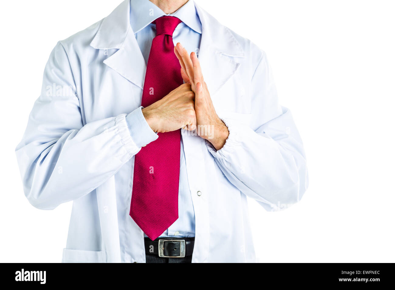 Caucasian male doctor dressed in white coat, blue shirt and red tie is ...