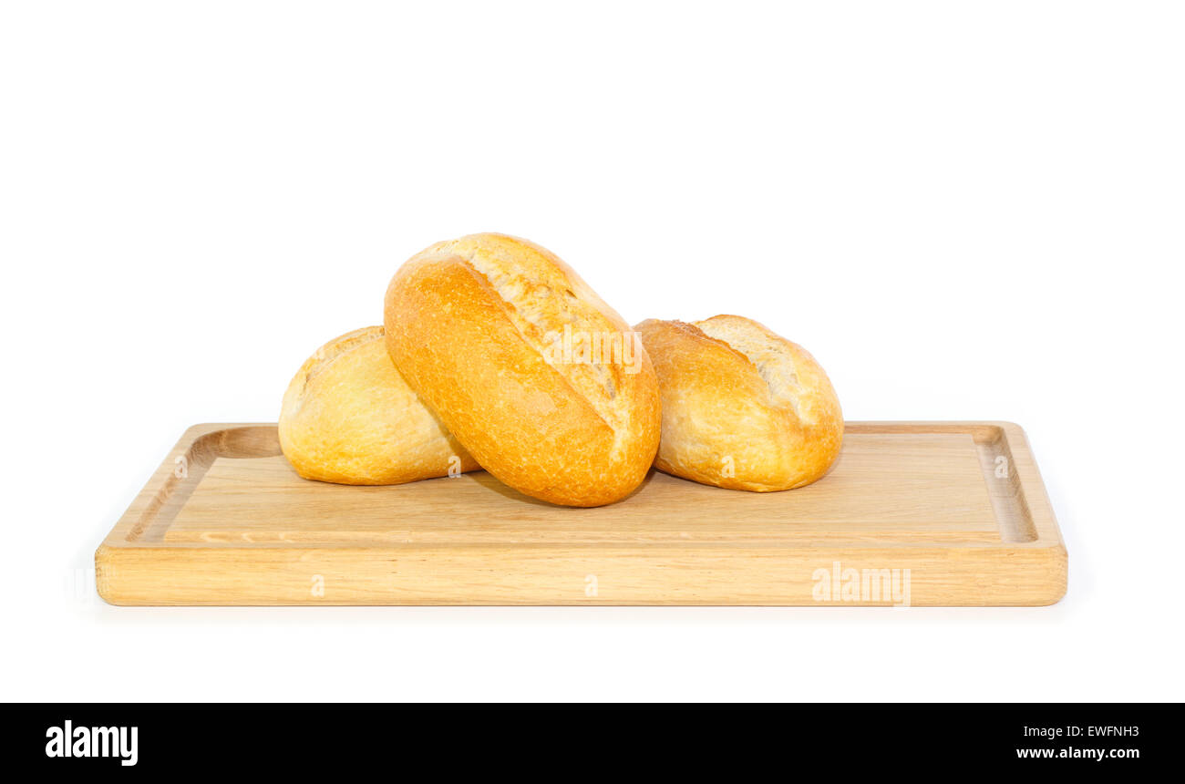 Fresh German bread rolls on a wooden breakfast tray against white ...