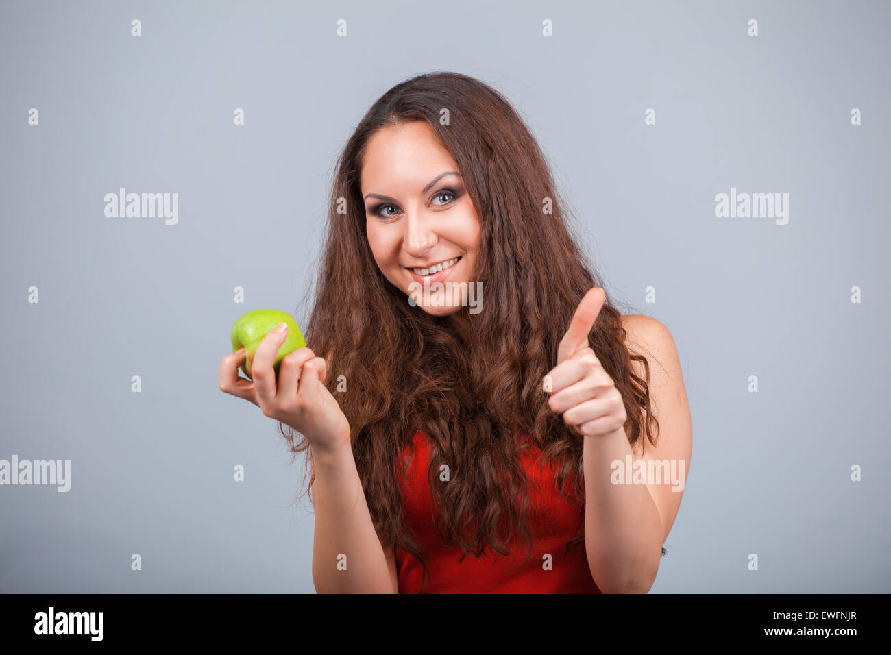 Girl and apple Stock Photo - Alamy