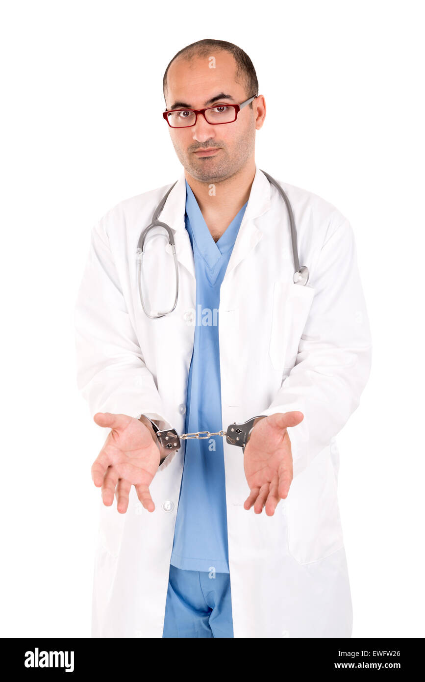 Male doctor in handcuffs isolated in a white background Stock Photo - Alamy