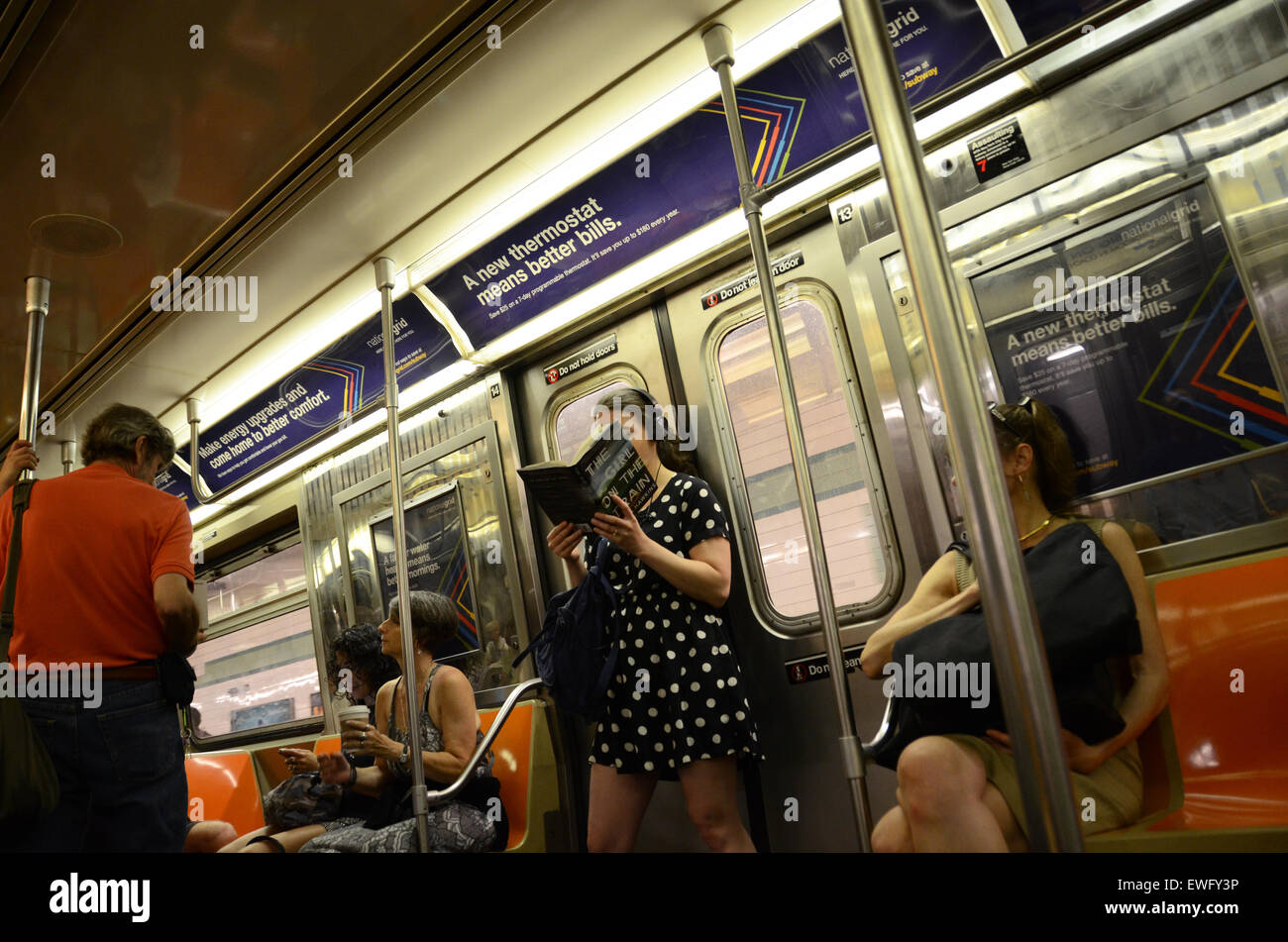 Woman on subway hi-res stock photography and images - Alamy