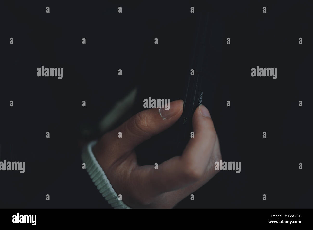 Hand Holding Electronic Device Stock Photo - Alamy