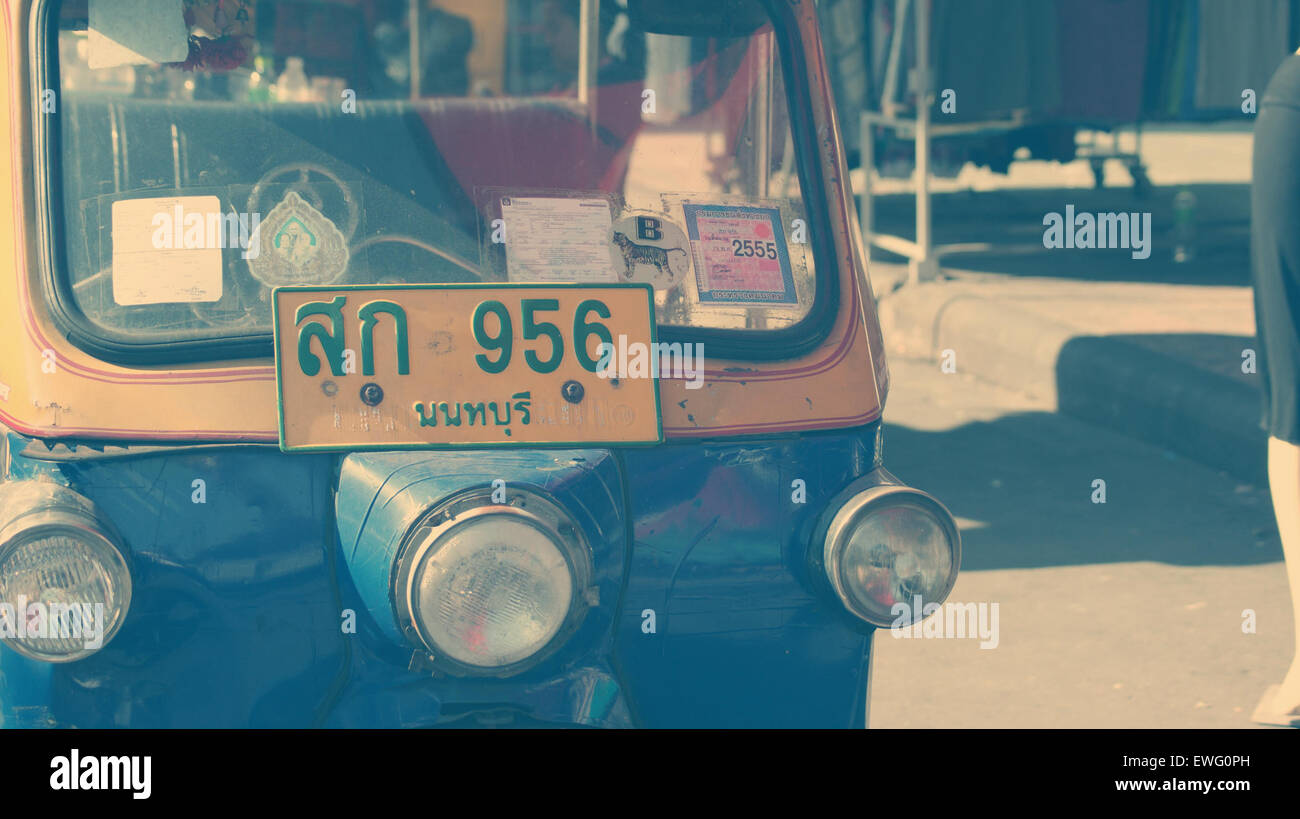 The front view of a small automobile is captured, highlighting its ...