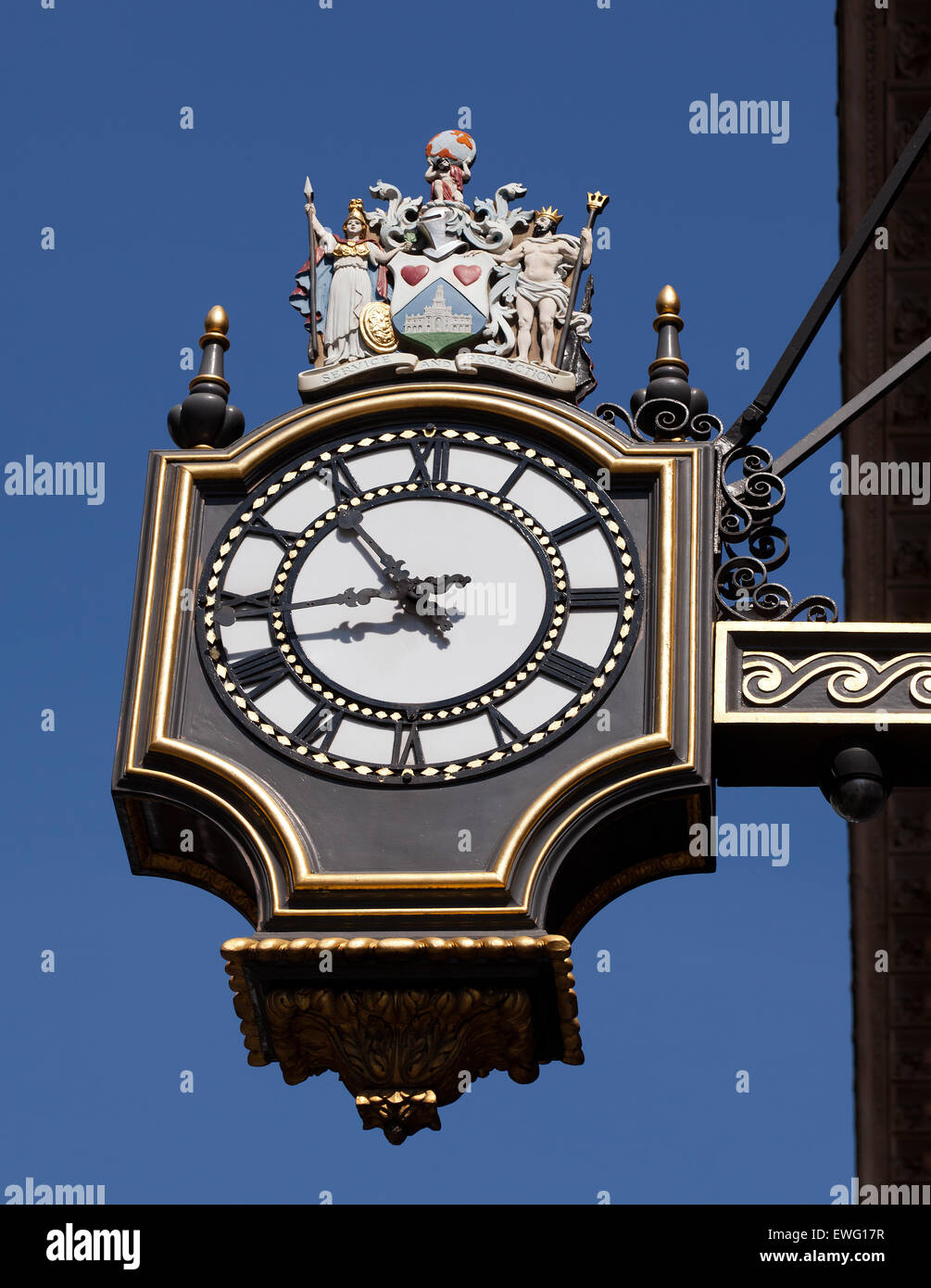 With clock and coat of arms hi-res stock photography and images - Alamy