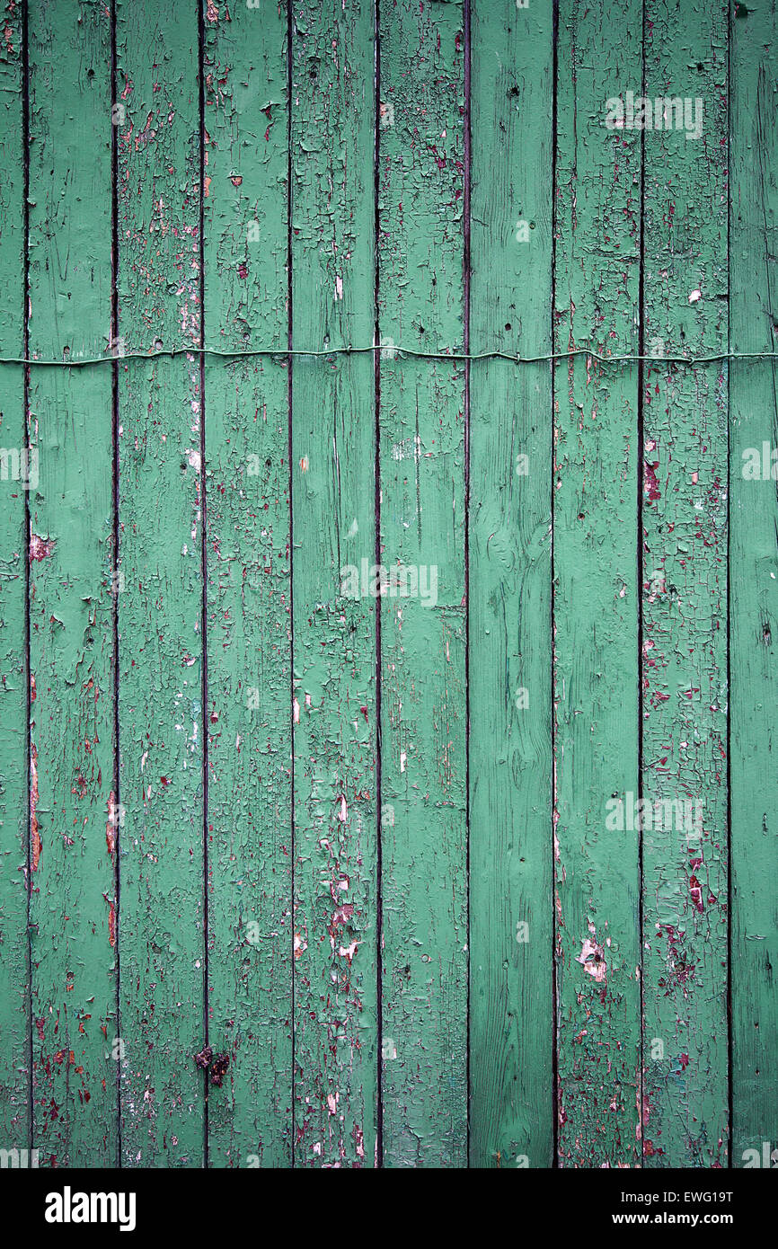 Peeling green paint on weathered wood texture Stock Photo - Alamy