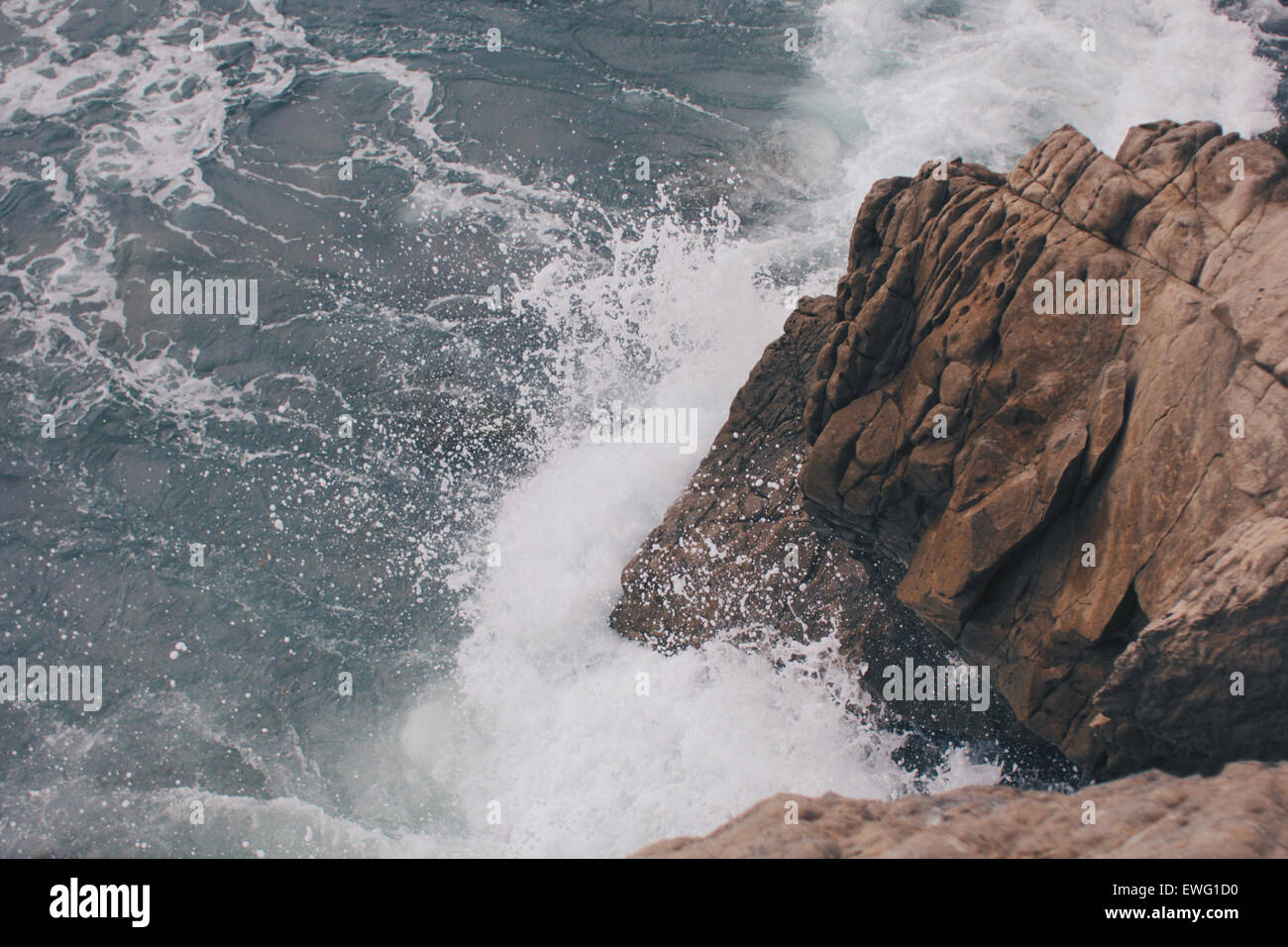 Ocean Waves Hitting an Outcrop Stock Photo - Alamy