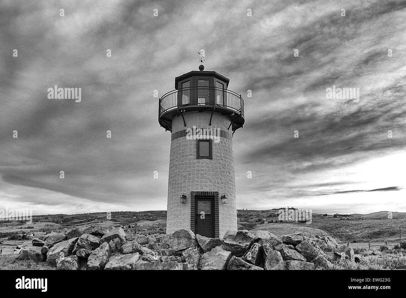 White Lighthouse in Monochrome Bear Lake Clouds Stones black And White ...