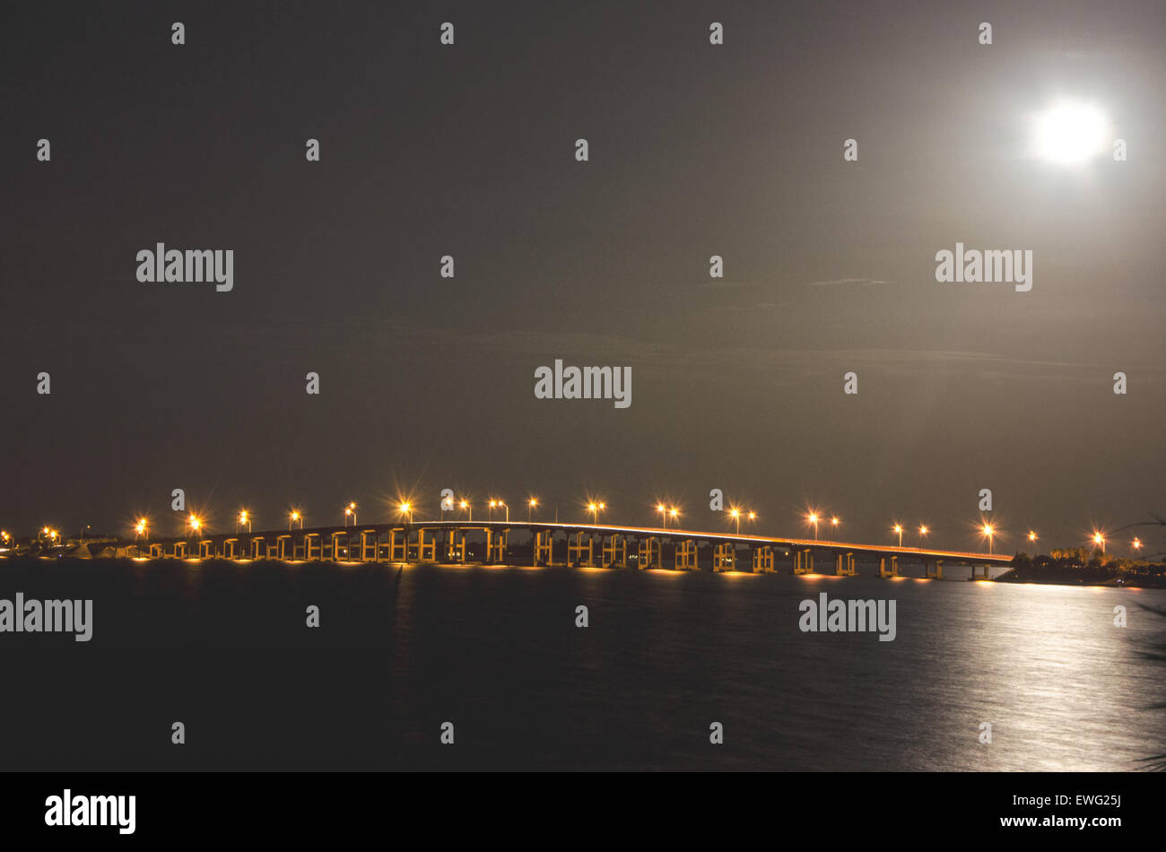 Bridge Over Water at Night Stock Photo - Alamy