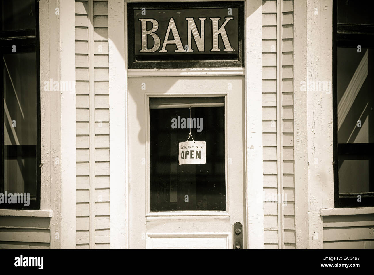 Open sign the window of an old-fashion bank Stock Photo - Alamy