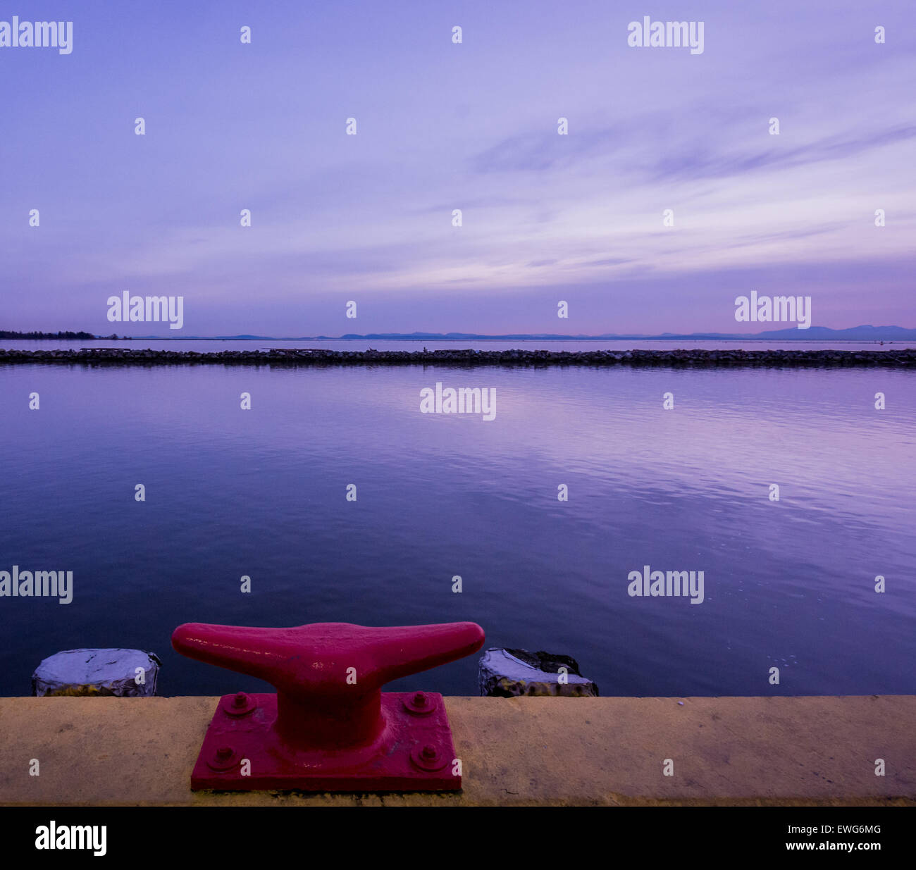 Red ships cleat on dock Stock Photo - Alamy