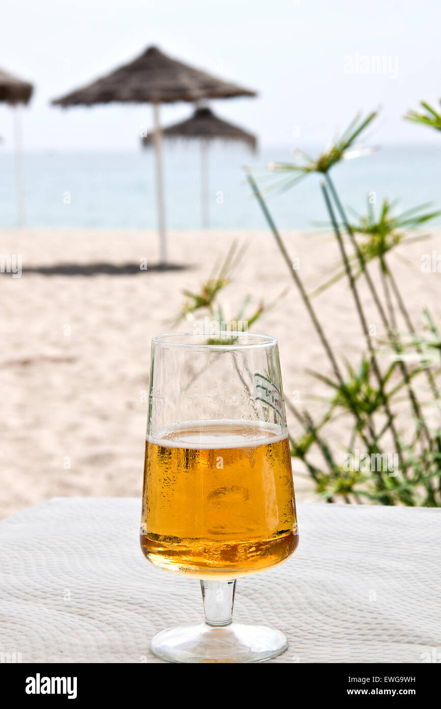 Cup of beer at beach Stock Photo - Alamy