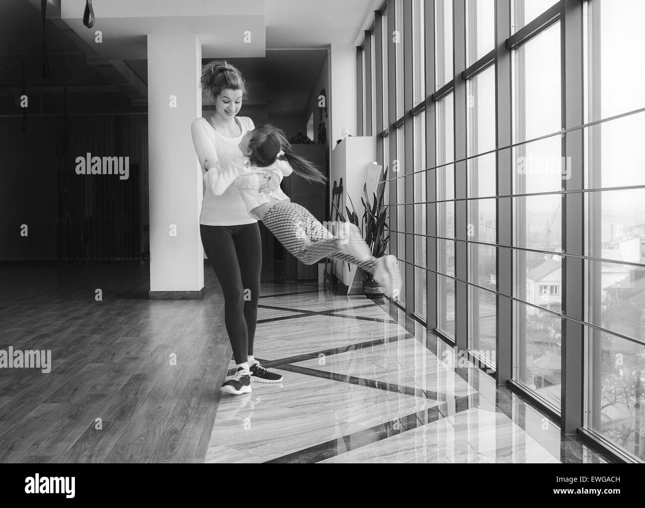 Cheerful mother child in Black and White Stock Photos & Images - Alamy
