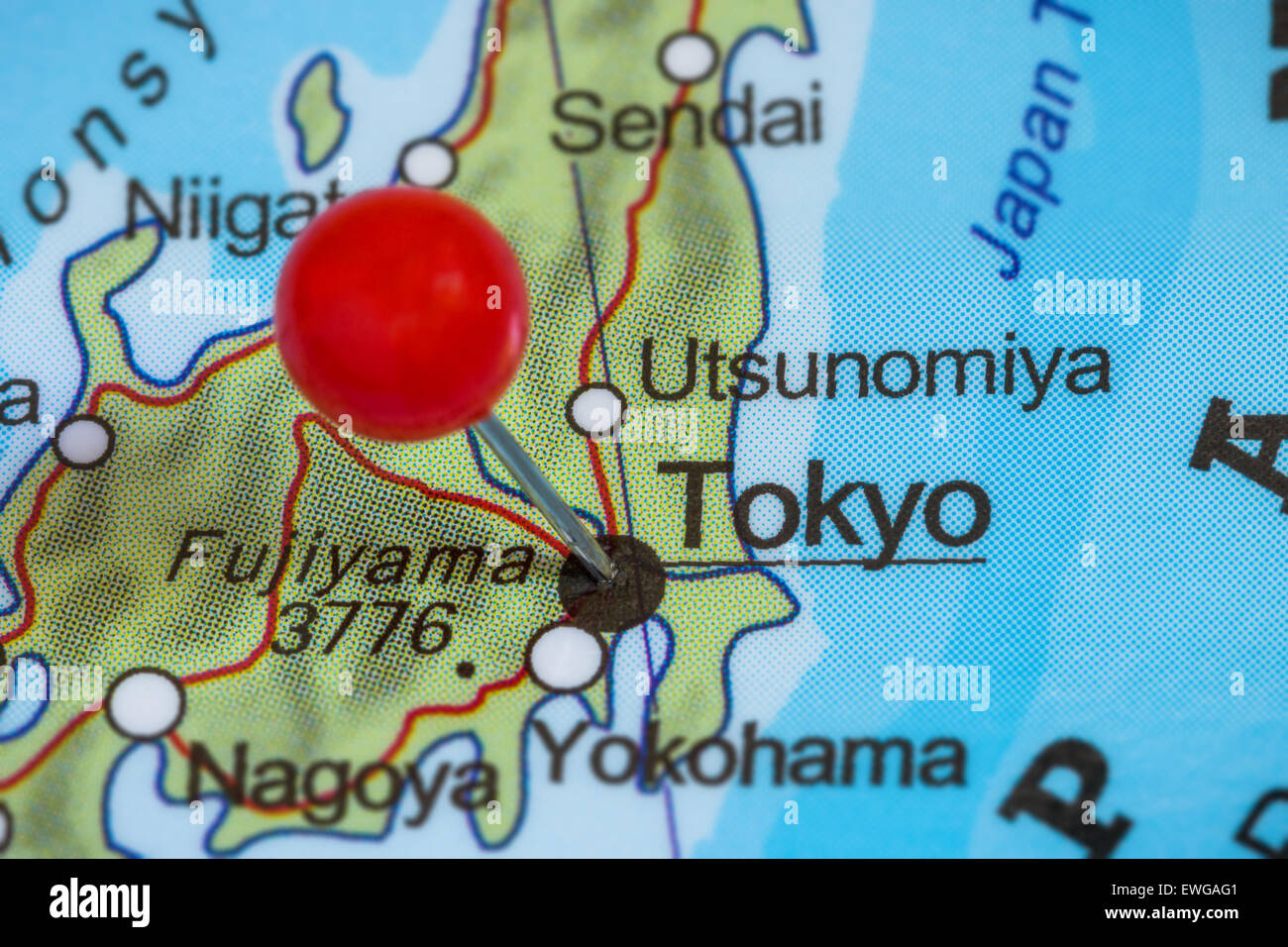 Close-up of a red pushpin on a map of Tokyo, Japan Stock Photo - Alamy