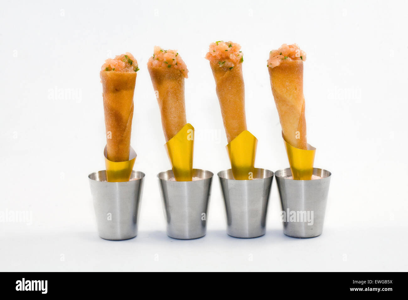 Salmon Tartar Appetizer in a Rolled Cornet Standing in Salt Cup Stock ...