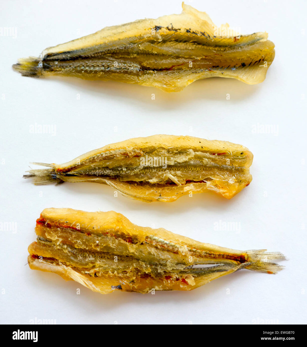 The Dried Fish on a color background Stock Photo - Alamy