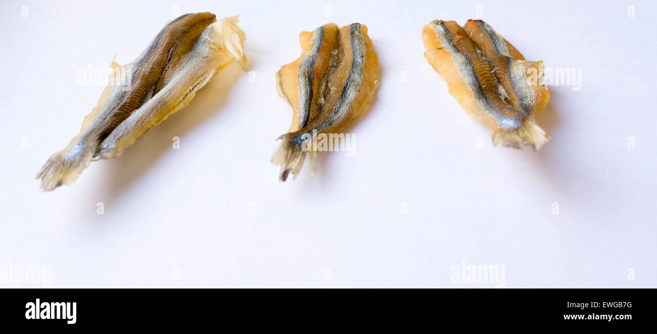 The Dried Fish on a color background Stock Photo - Alamy