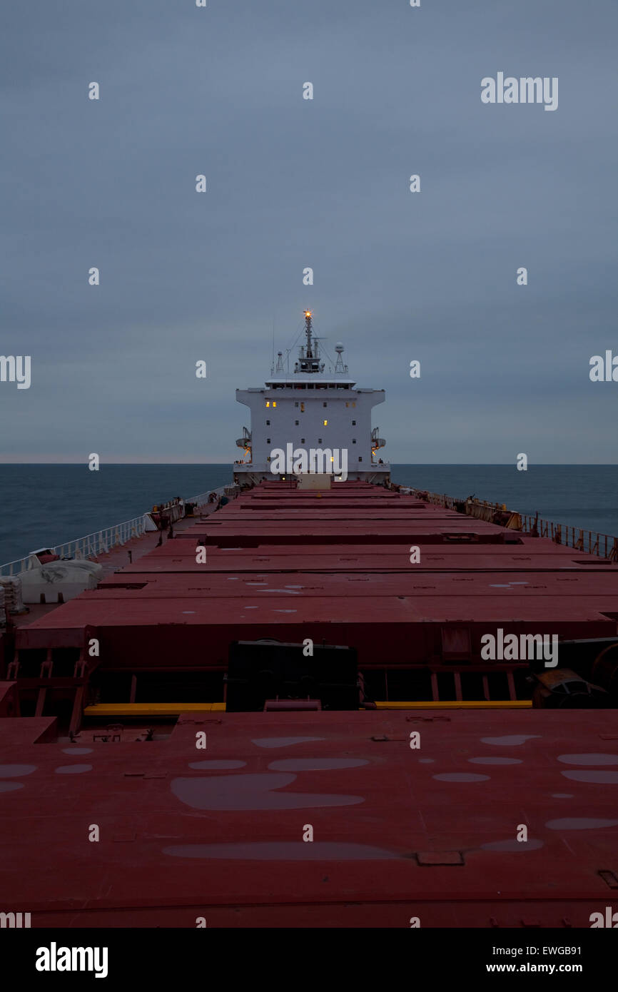 bulk laker ship underway at sunset Stock Photo - Alamy