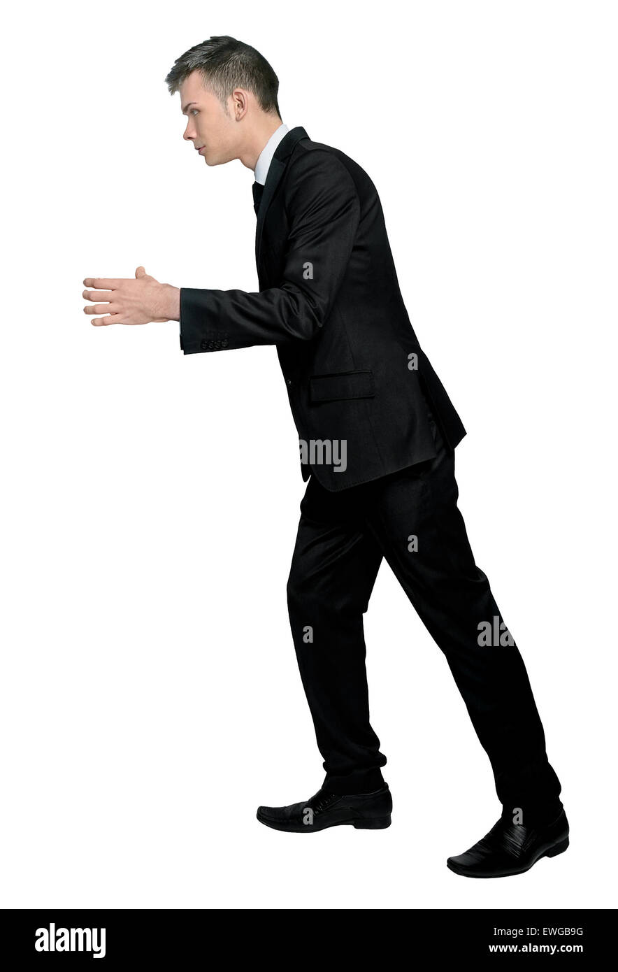 Isolated business man pushing nothing Stock Photo - Alamy