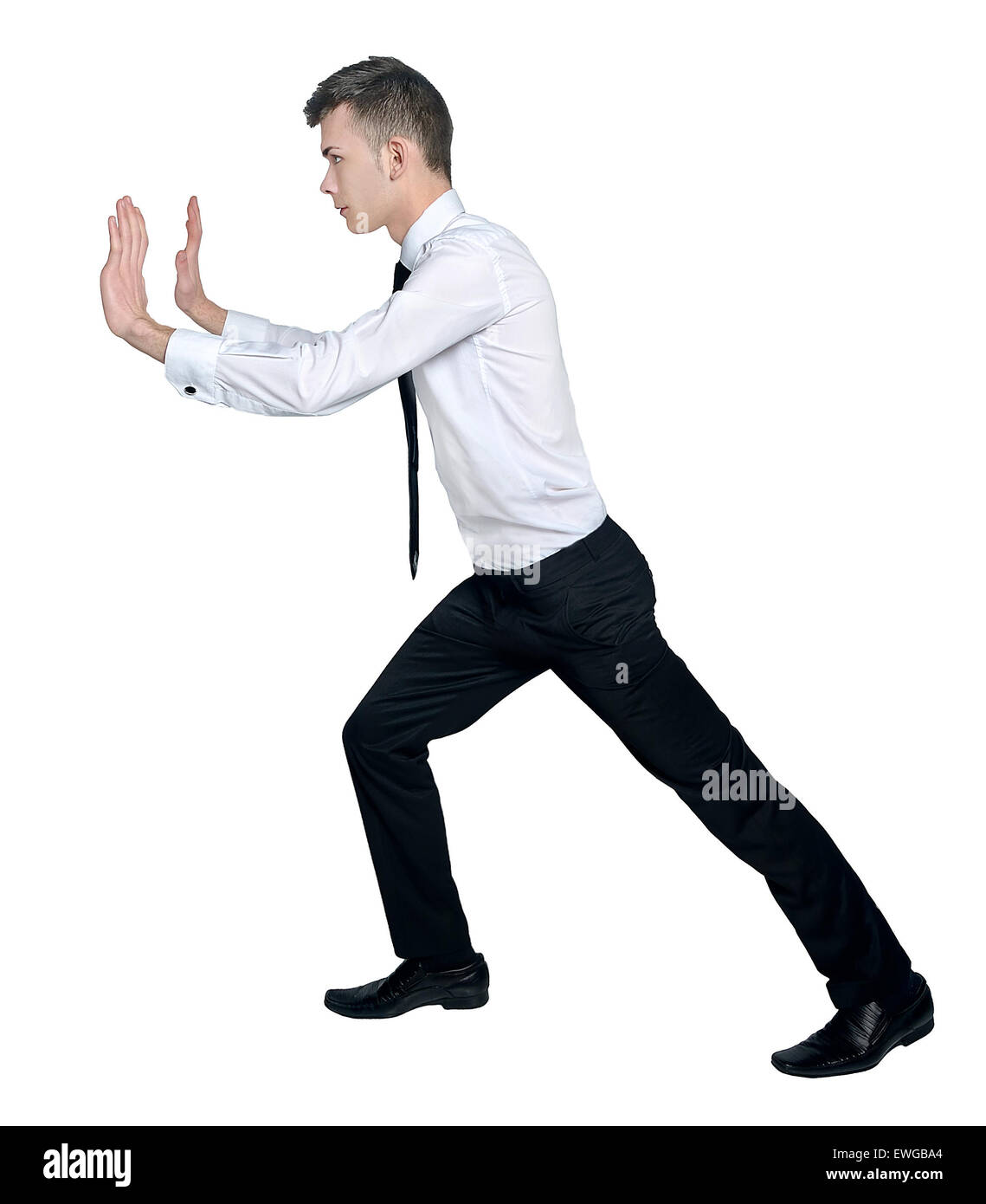 Isolated business man pushing something Stock Photo - Alamy Isolated business man pushing something Stock Photo - Alamy