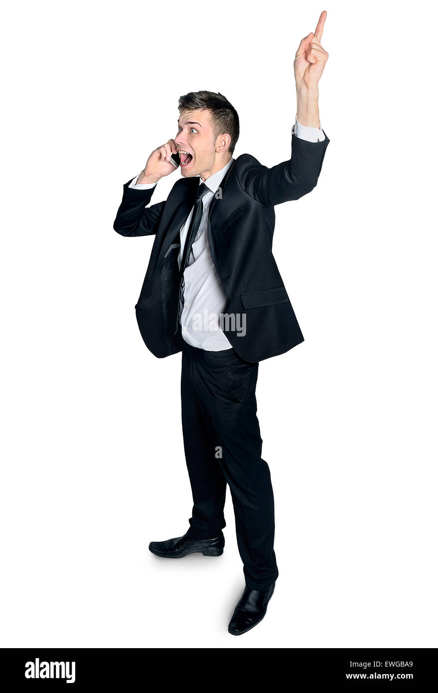Business man pointing up when phone talking Stock Photo - Alamy