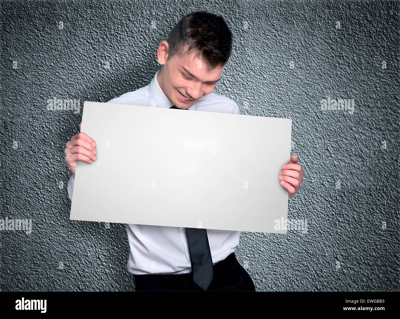 Business man with empty board Stock Photo - Alamy