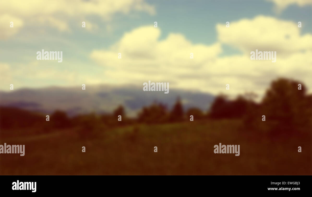 A blurred image of mountain landscape Stock Photo - Alamy