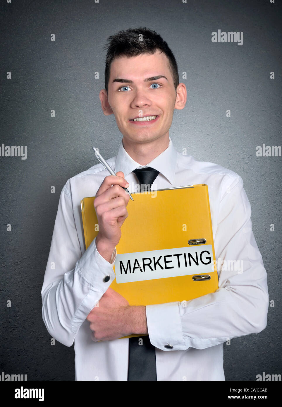 Young man with marketing folder Stock Photo - Alamy