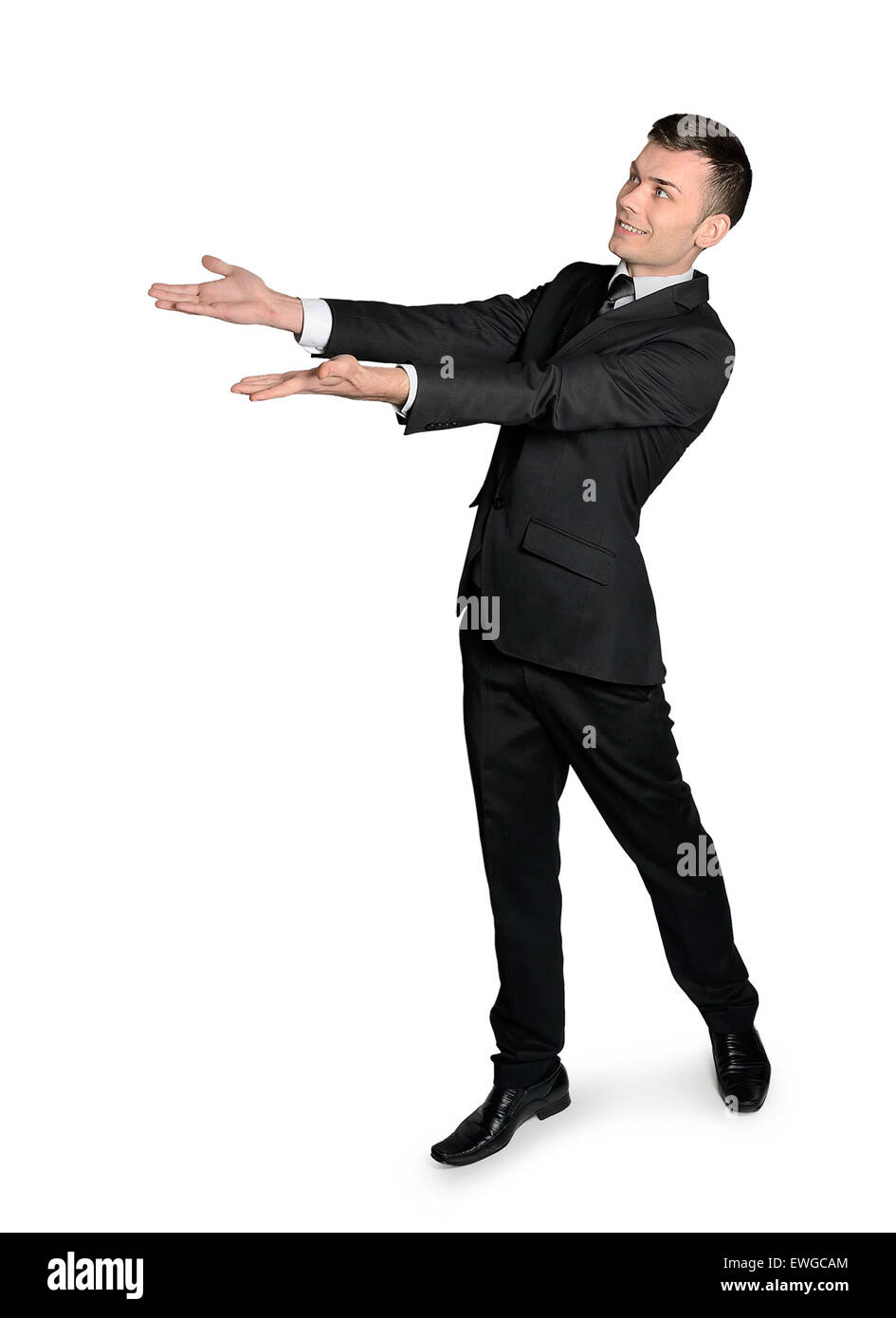 Isolated business man offering something Stock Photo - Alamy