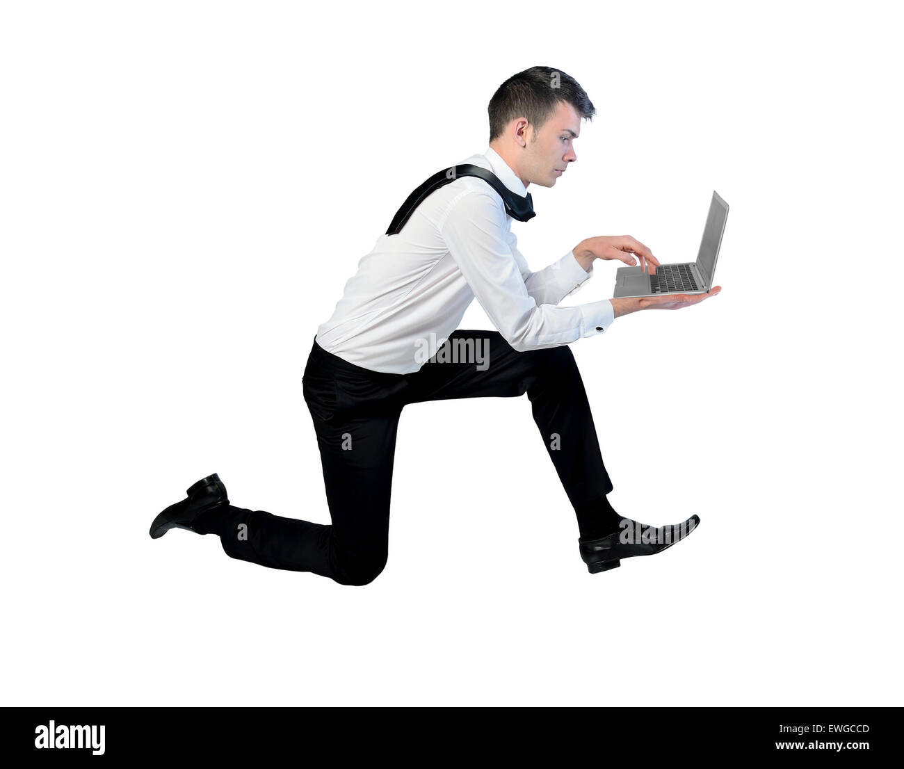 Business man run with laptop Stock Photo - Alamy