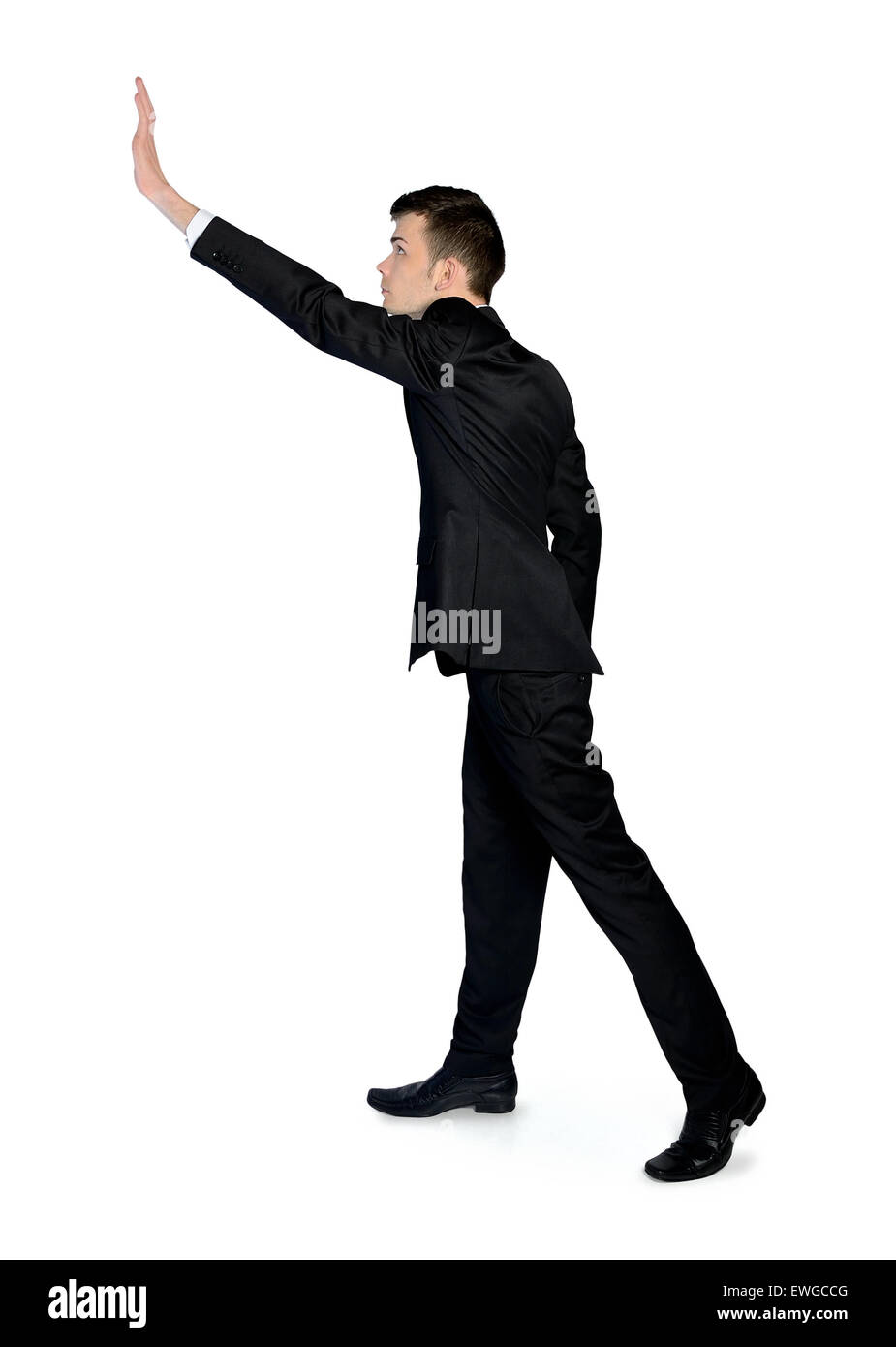 Business man push something with one hand Stock Photo - Alamy