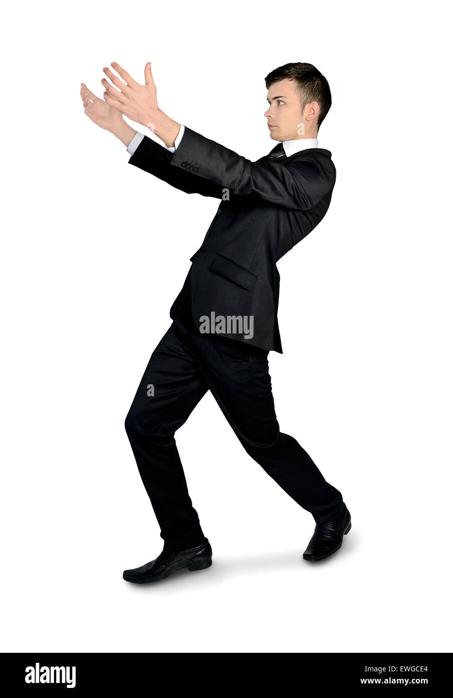 Isolated business man carrying something Stock Photo - Alamy
